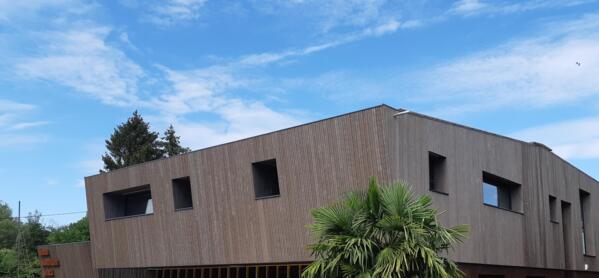 Wood cladding - pre-weathered larch wood cladding with false openwork ...